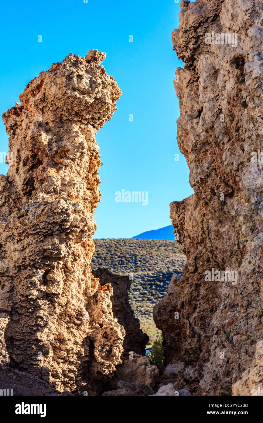 A mountain range with a large rock formation in the middle. The rock ...