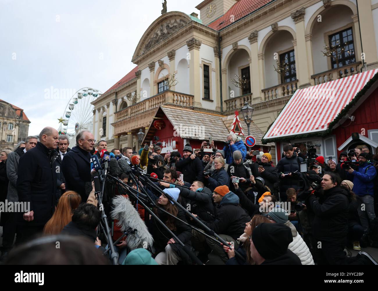 Magdeburg, Germany. 21st Dec, 2024. Federal Chancellor Olaf Scholz (l ...