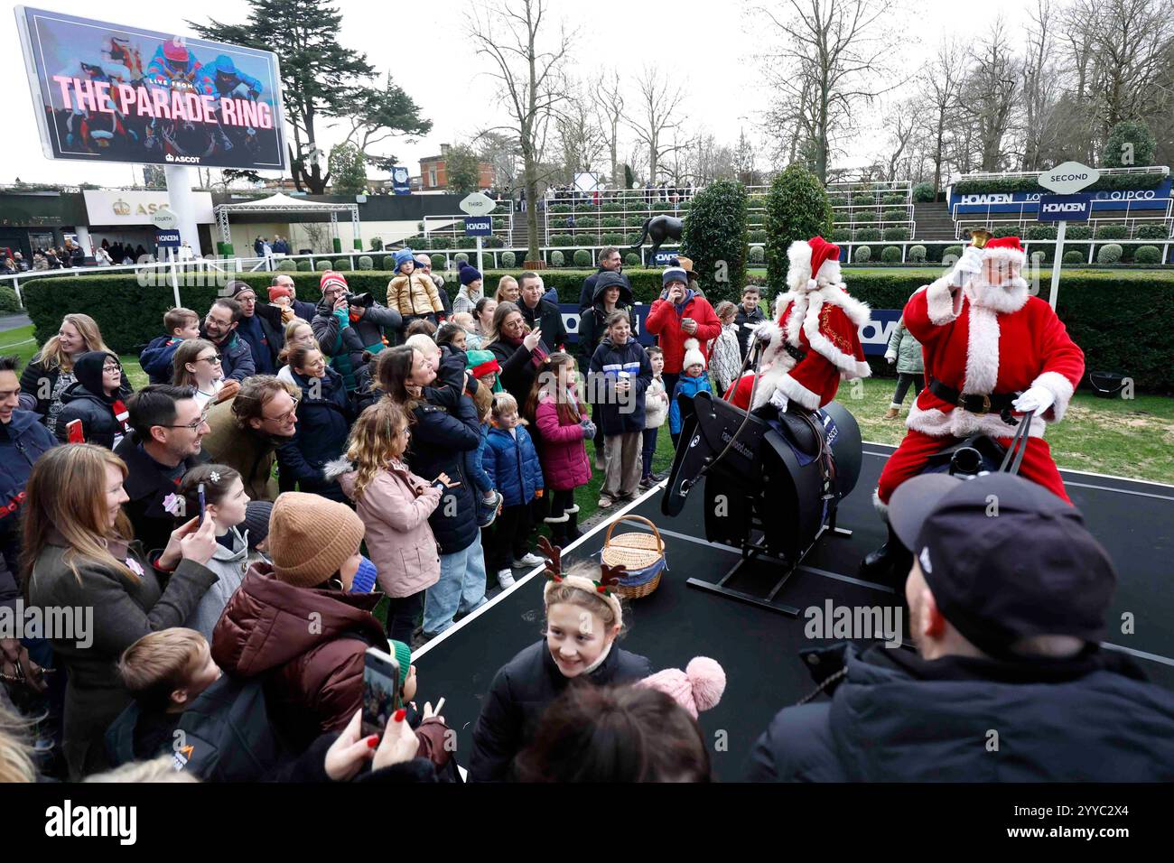 Two Santa's on mechanical horse before the Howden Christmas Racing ...