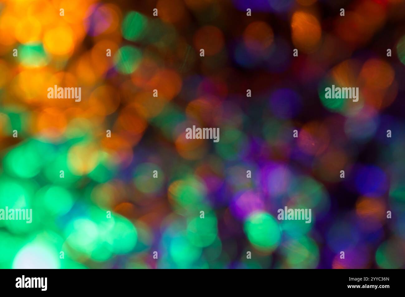 Points of multicolored light in a blurred abstract background Stock ...