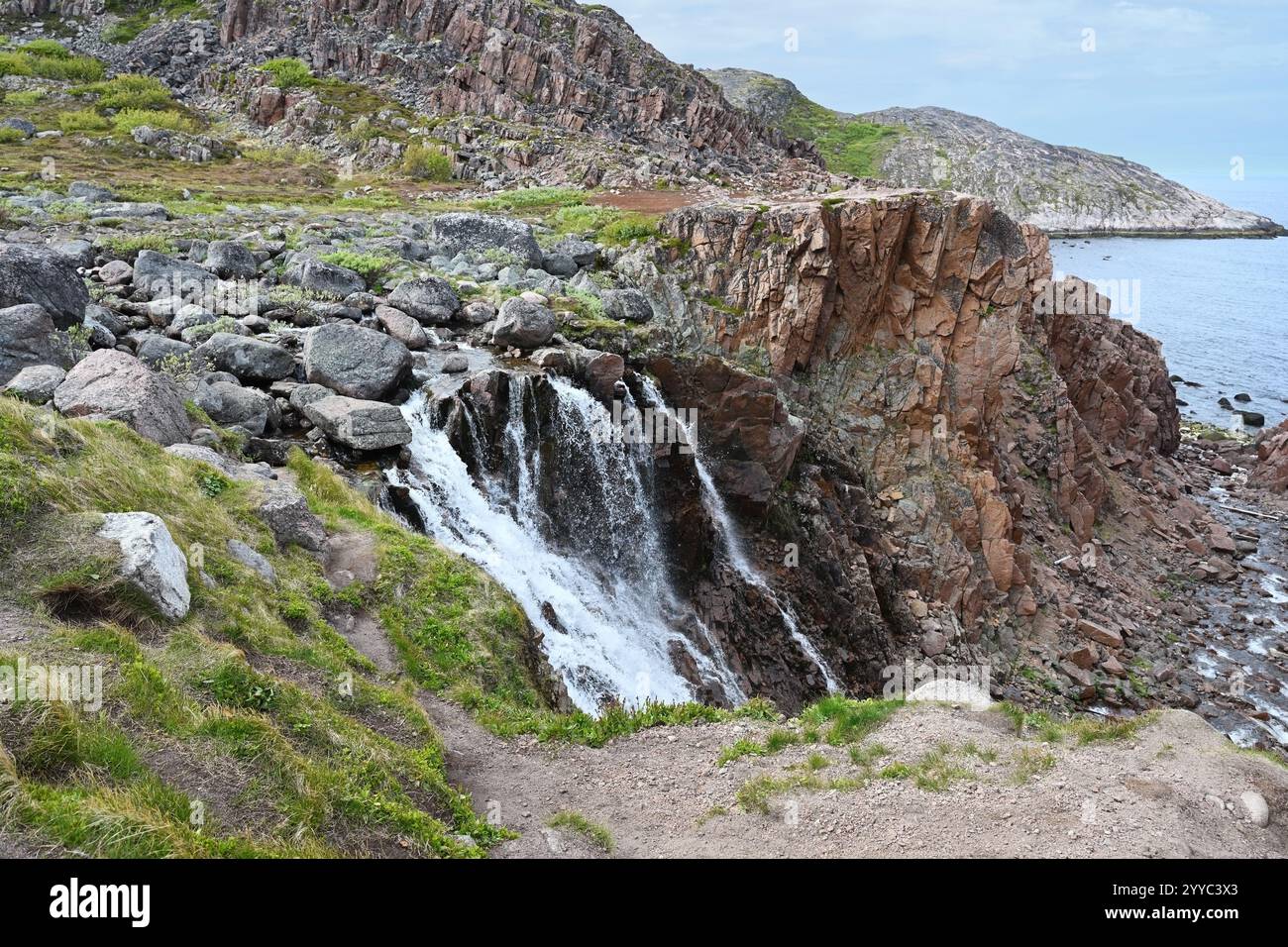 Beautiful waterfall in Teriberka. Arctic landscape with a view of a ...