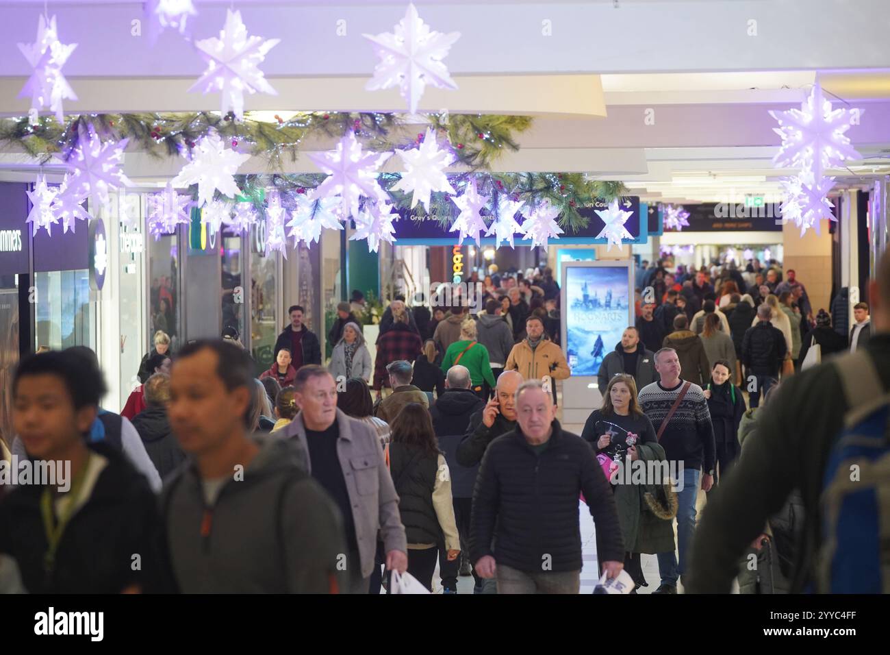Shoppers in Eldon Square shopping centre, Newcastle, ahead of Christmas Day on Wednesday ...