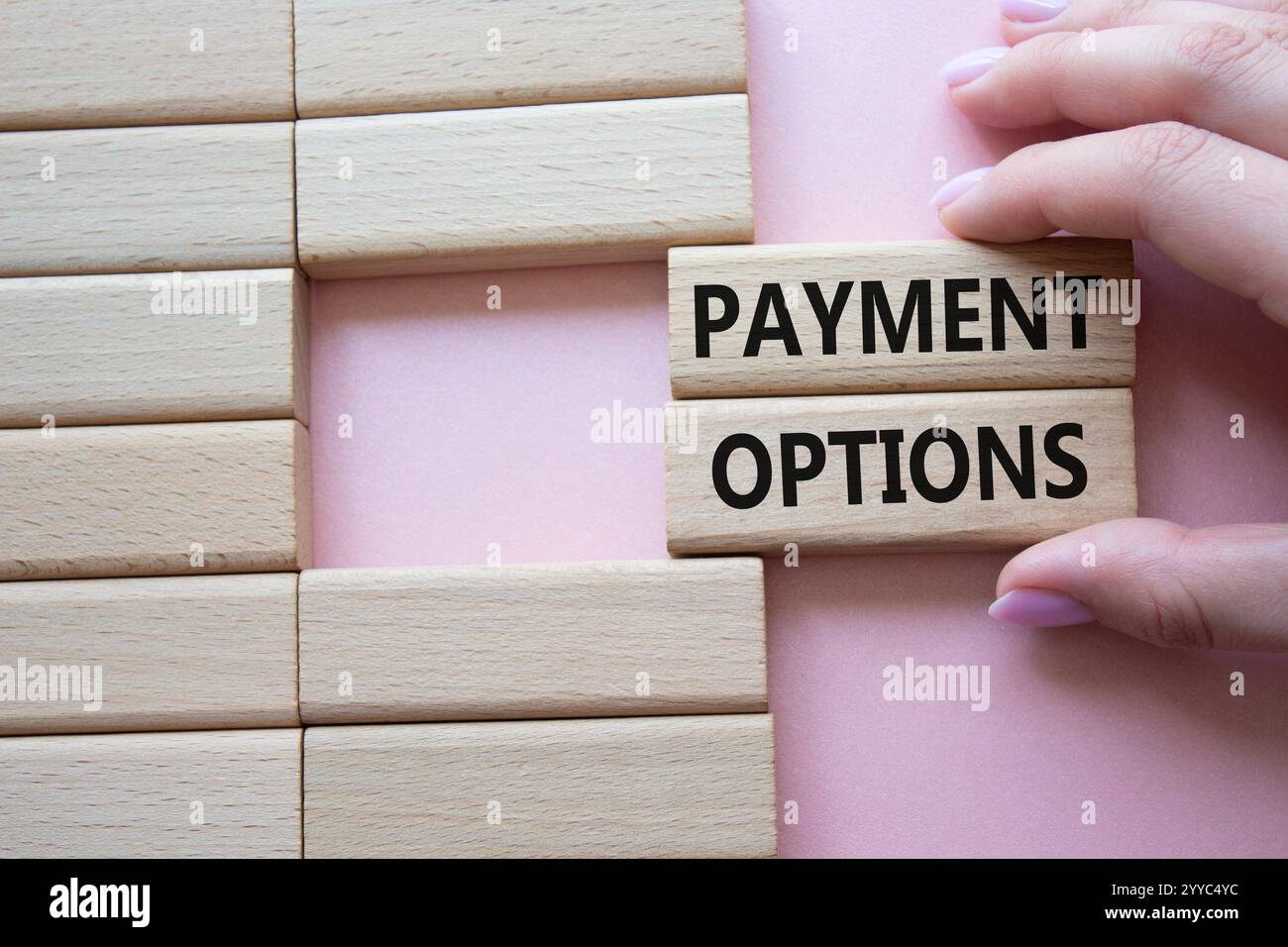 Payment Options symbol. Concept words Payment Options on wooden blocks ...