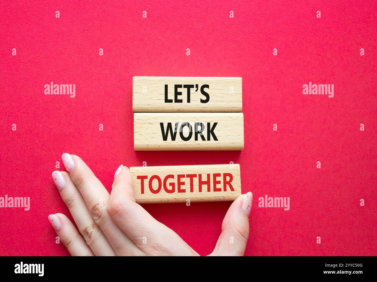 Lets work together symbol. Concept words Less is More on wooden blocks ...