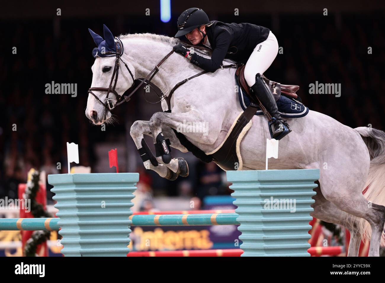 Katharina Rhomberg of Austria with Colestus Cambridge during the London ...