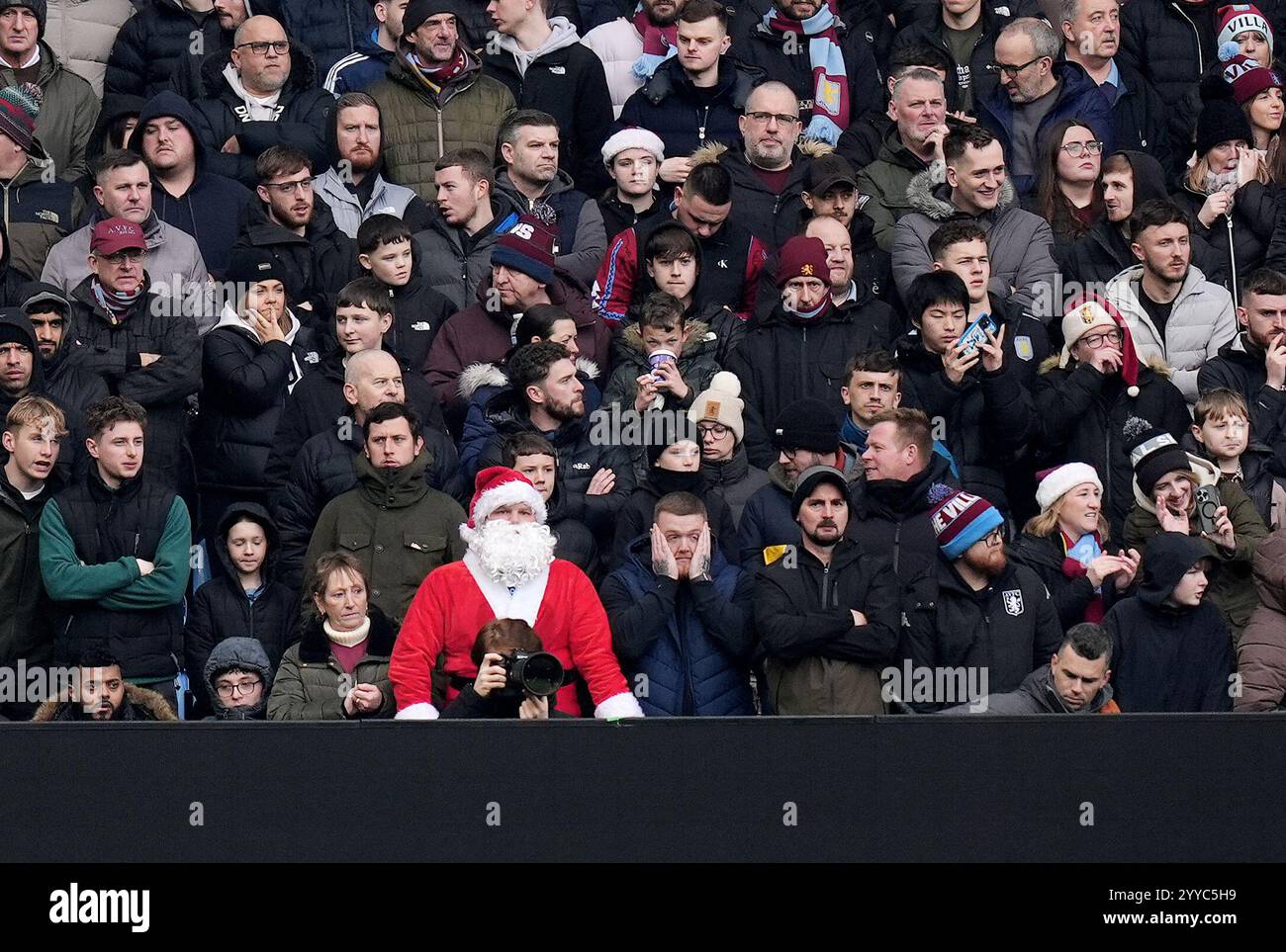 A fan dressed as Santa Clause in the stands during the Premier League ...
