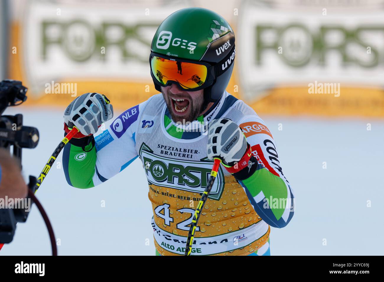 Slovenia's Martin Cater celebrates at the finish area of an alpine ski ...