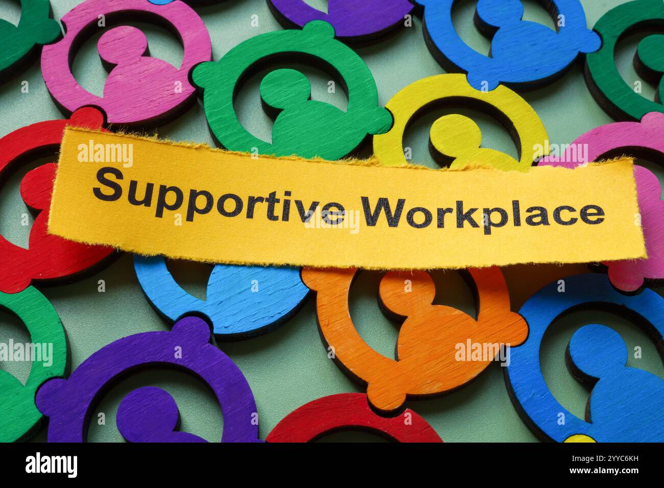 Supportive workplace with colorful figures. Teamwork and diversity ...