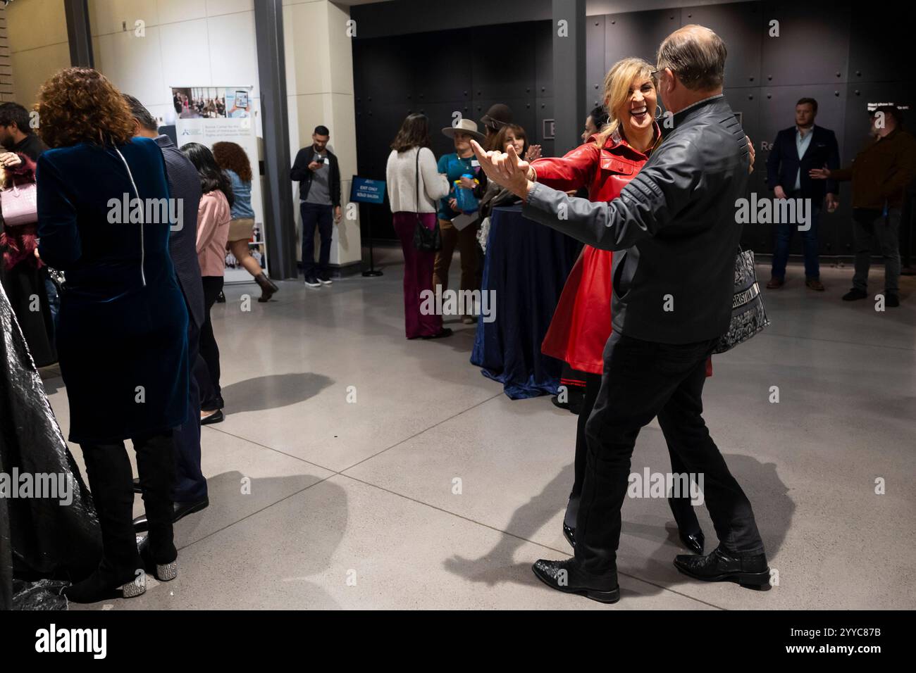 Dr. Annette Goldberg dances with Sheldon Weisfeld during a Chicanukah ...
