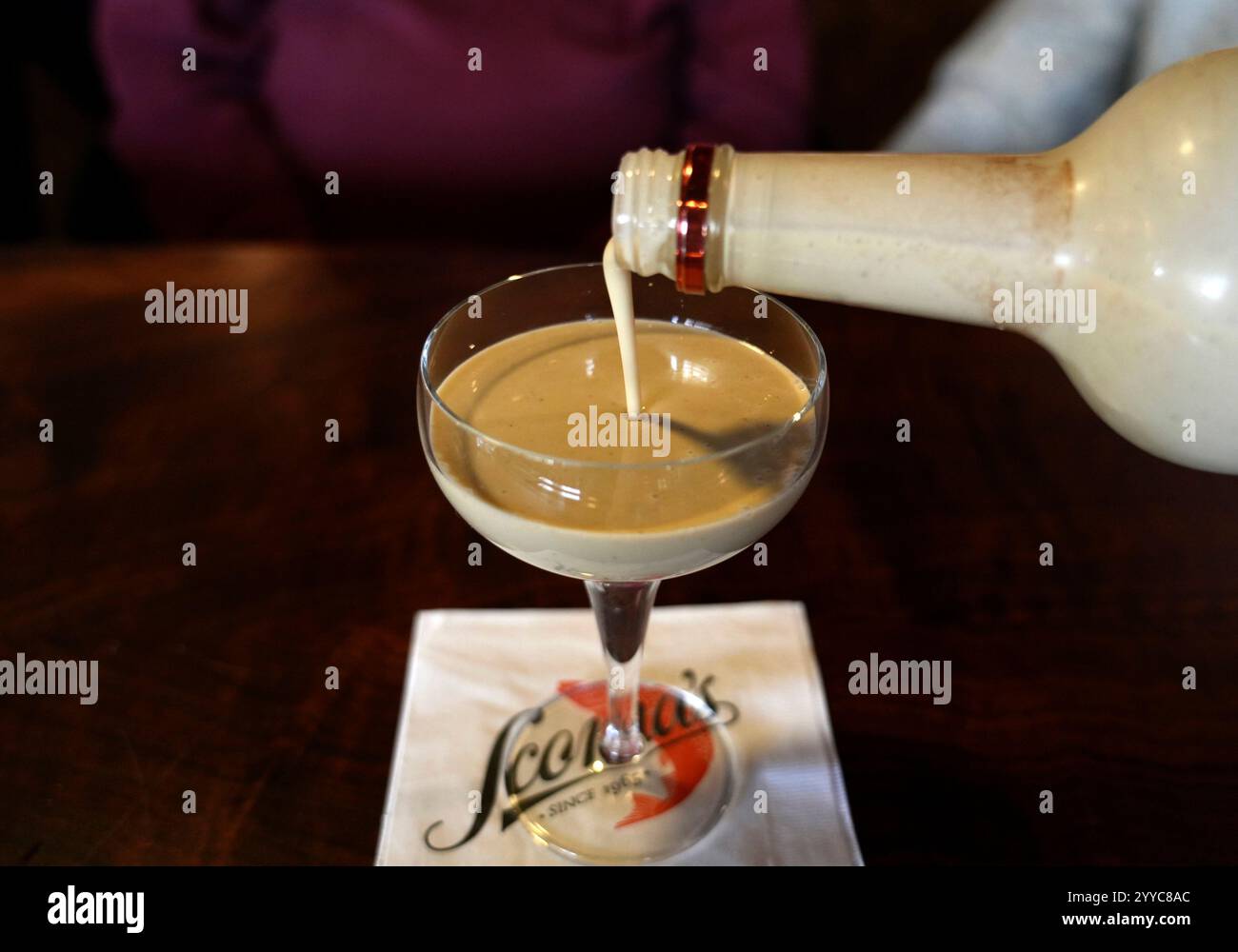 A glass of eggnog, which is prepared 11 months in advance, is shown at ...
