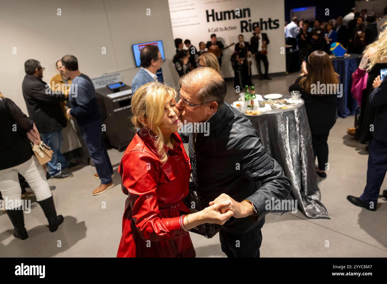 Dr. Annette Goldberg dances with Sheldon Weisfeld during a Chicanukah ...