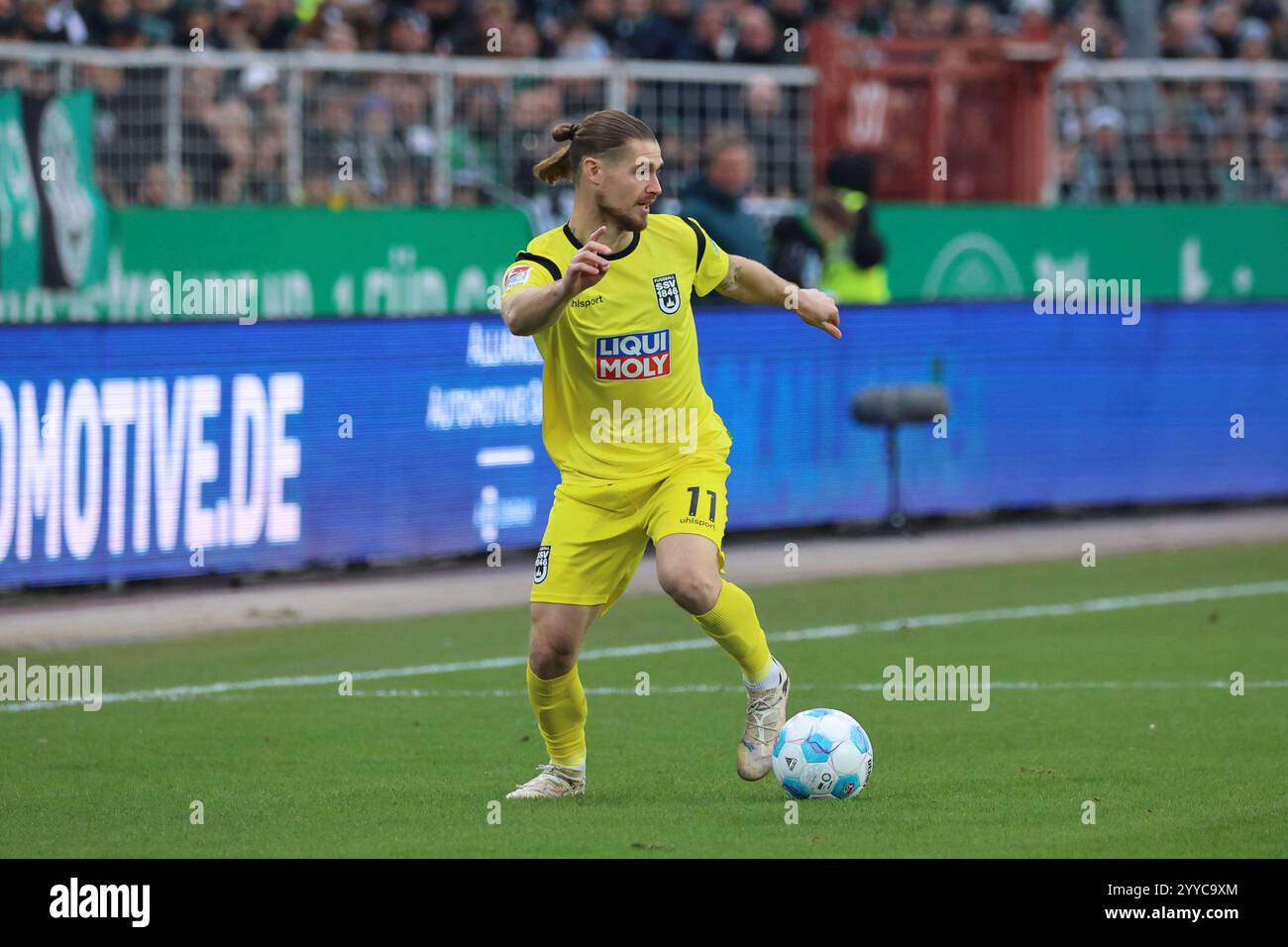 Muenster, Deutschland. 21st Dec, 2024. Dennis Chessa (SSV Ulm 1846, #11 ...