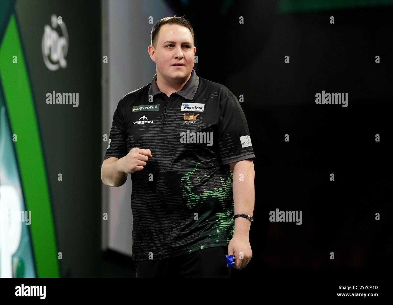 Rhys Griffin reacts after winning a leg during day seven of the Paddy Power World Darts ...