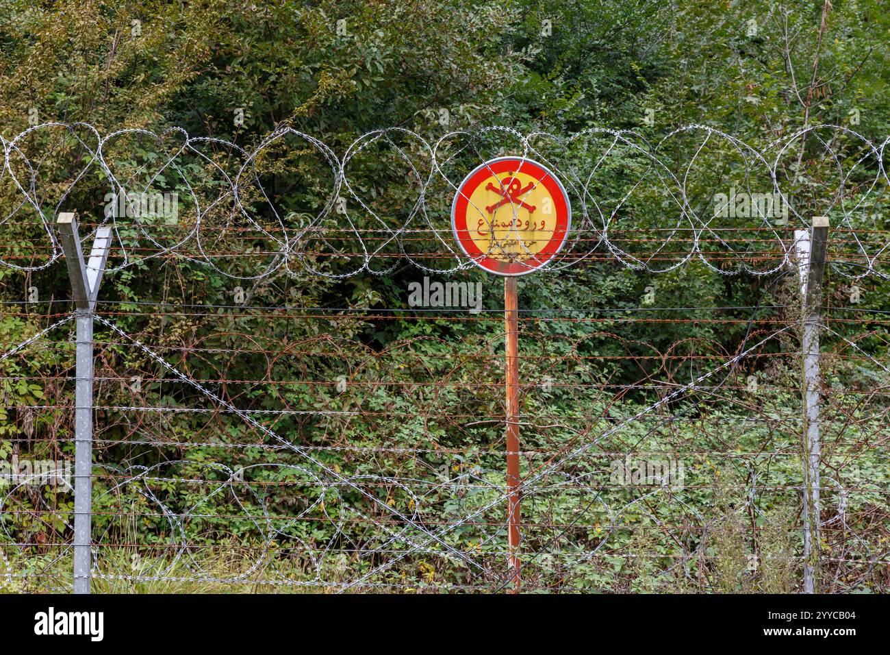 Gilan Province, Iran - September 28, 2024: Barbed wire and warning ...