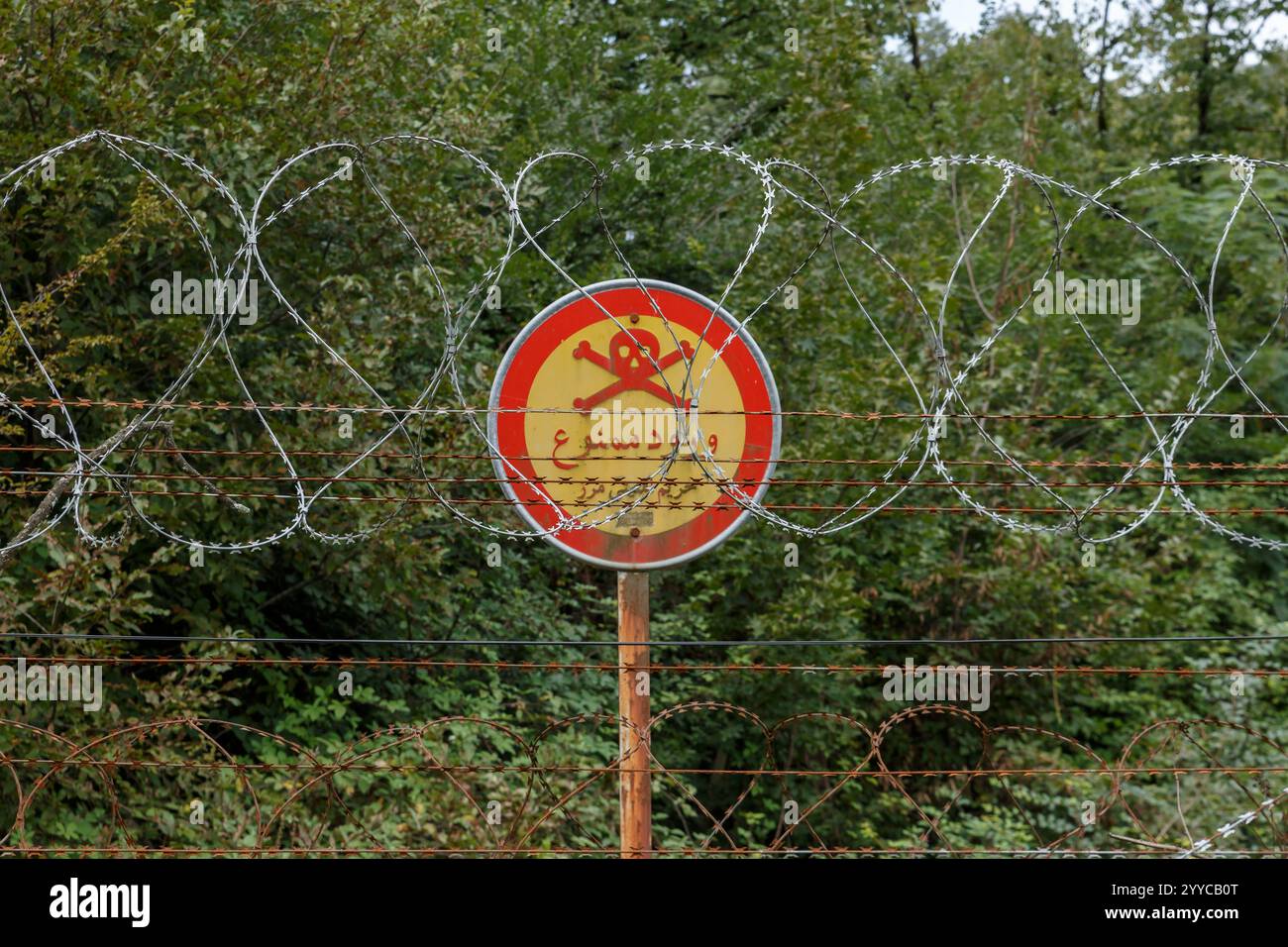 Gilan Province, Iran - September 28, 2024: A warning sign near the ...