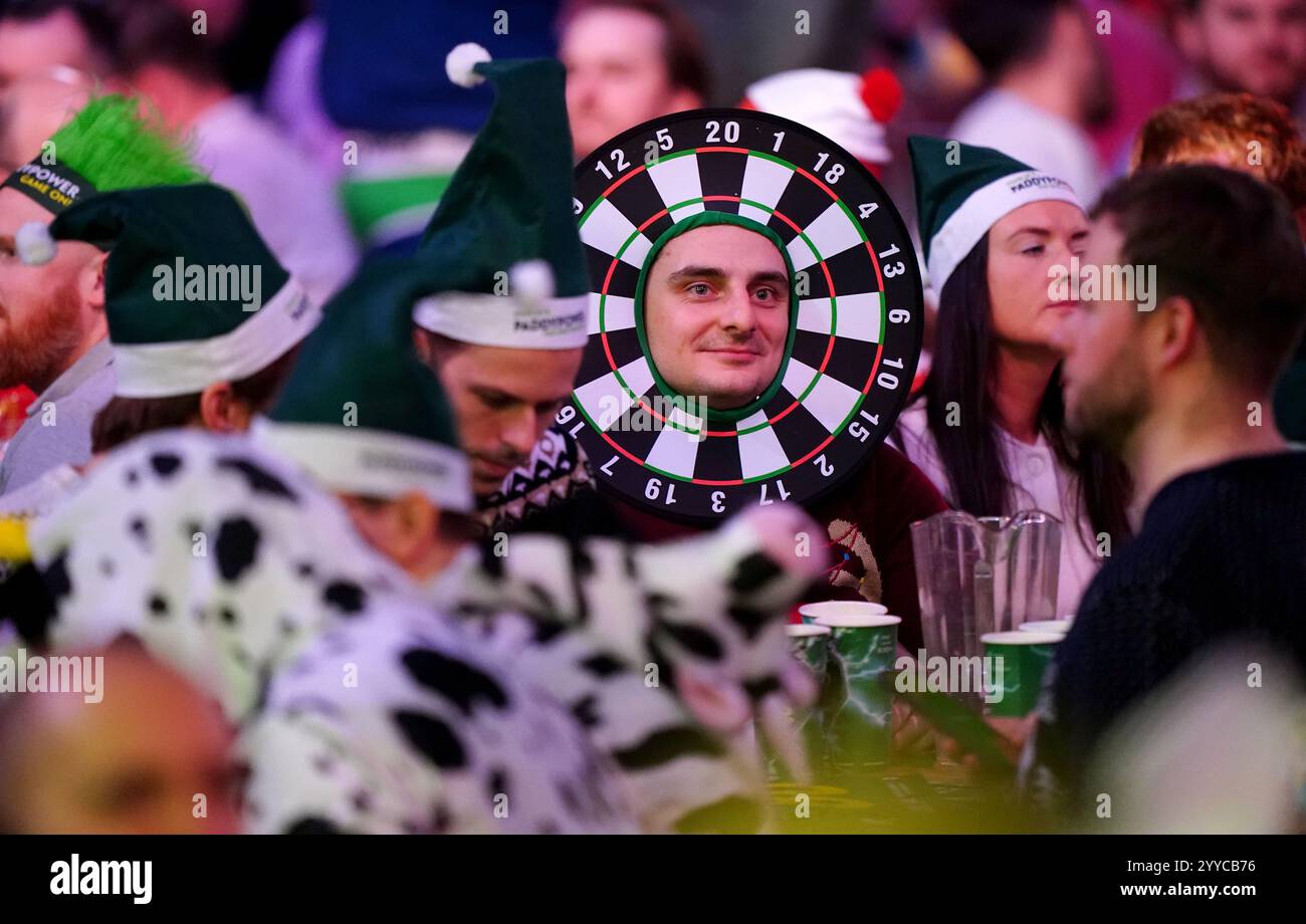 A spectator in fancy dress in the crowd during day seven of the Paddy ...
