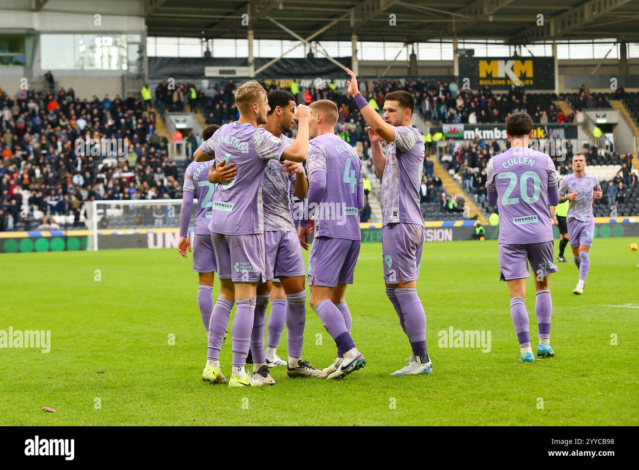 MKM Stadium, Hull, England - 21st December 2024 Swansea players congratulate Harry Darling (6 ...