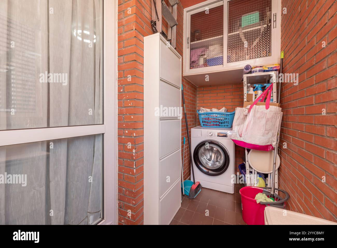 Laundry area on the terrace of an urban residential home Stock Photo ...