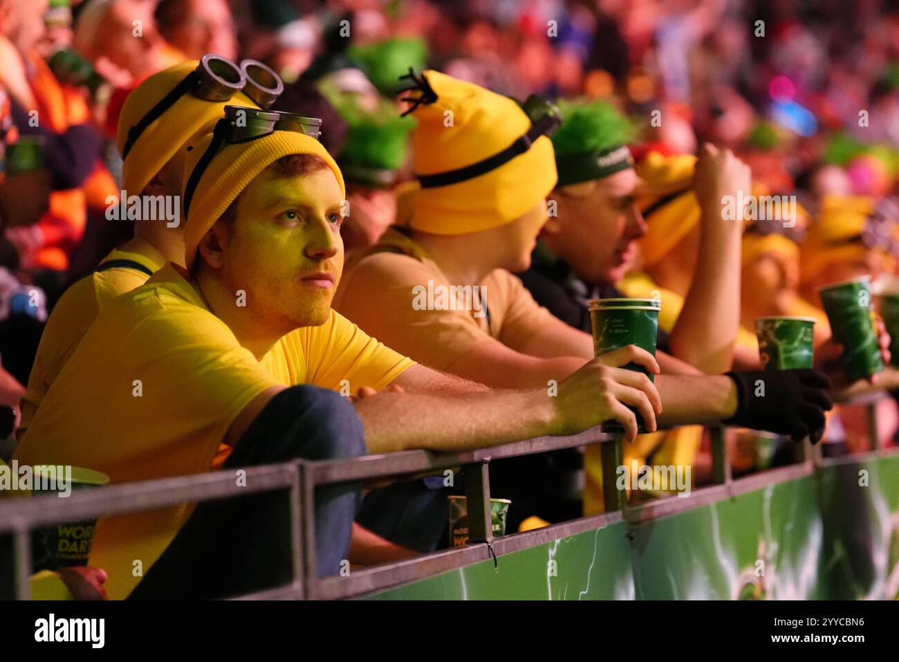 A general view of spectators in fancy dress in the crowd during day ...
