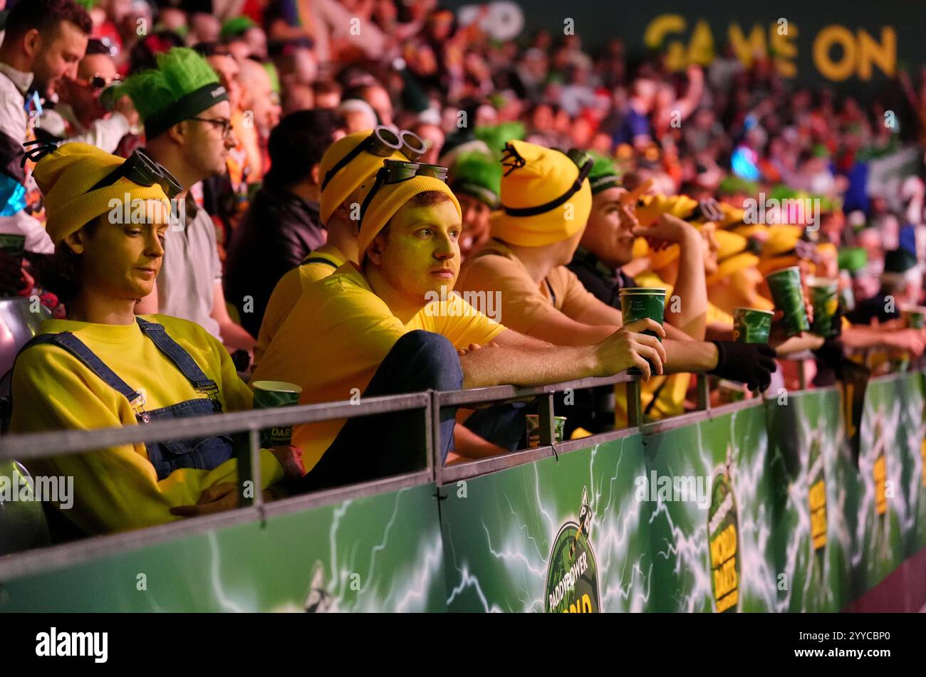 A general view of spectators in fancy dress in the crowd during day ...