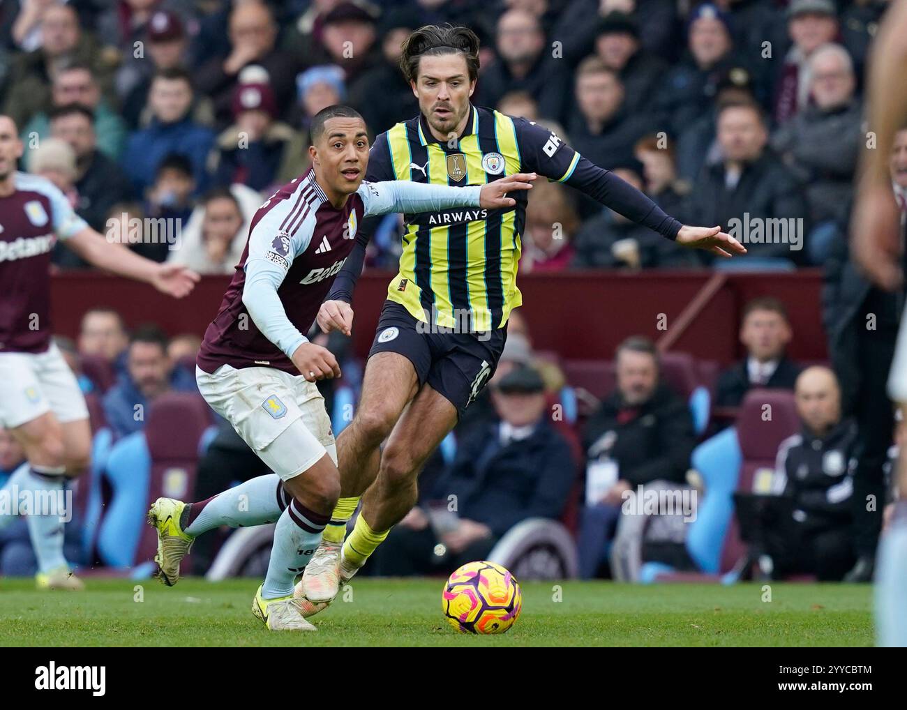 Birmingham, UK. 21st Dec, 2024. Aston Villa's Youri Tielemans tussles ...