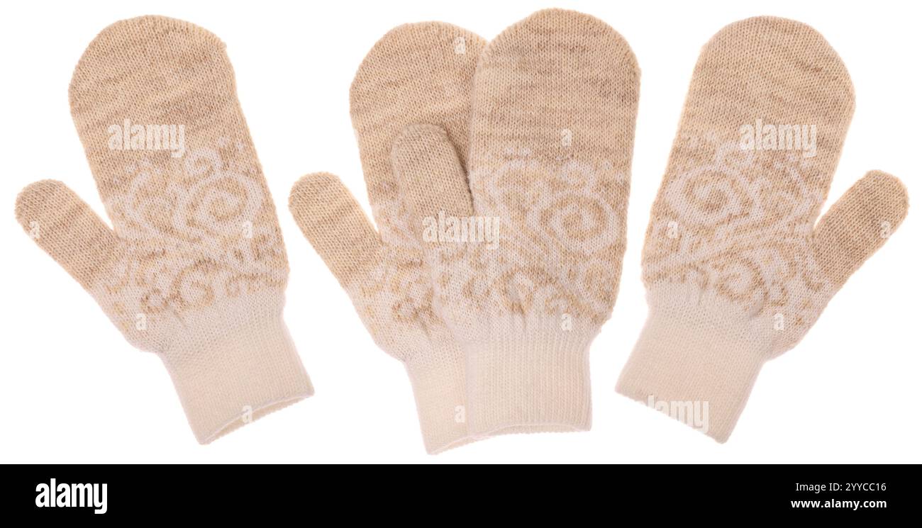 A set of beige knitted mittens with intricate decorative pattern ...