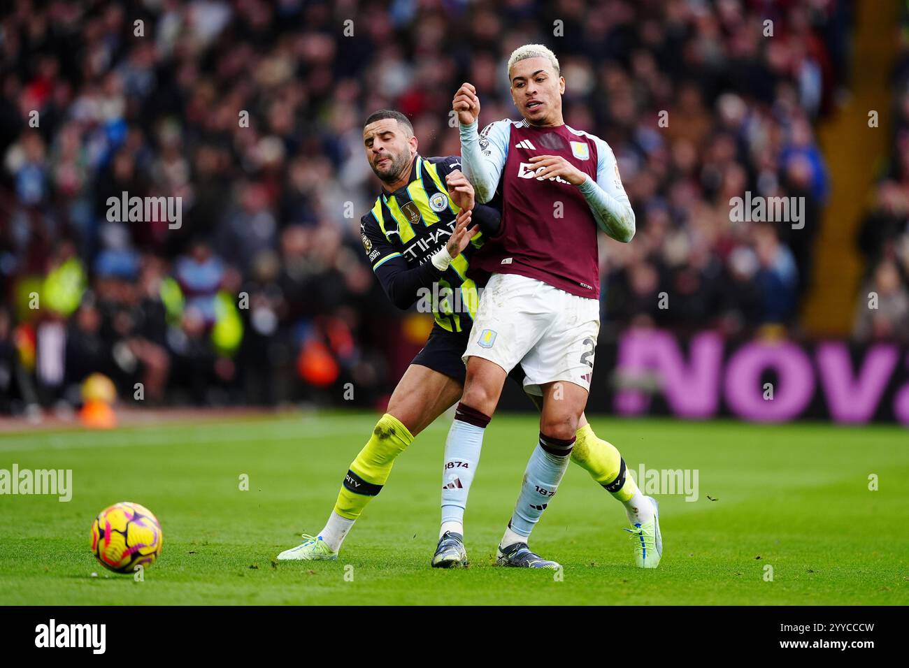 Manchester City's Kyle Walker (left) and Aston Villa's Morgan Rogers ...