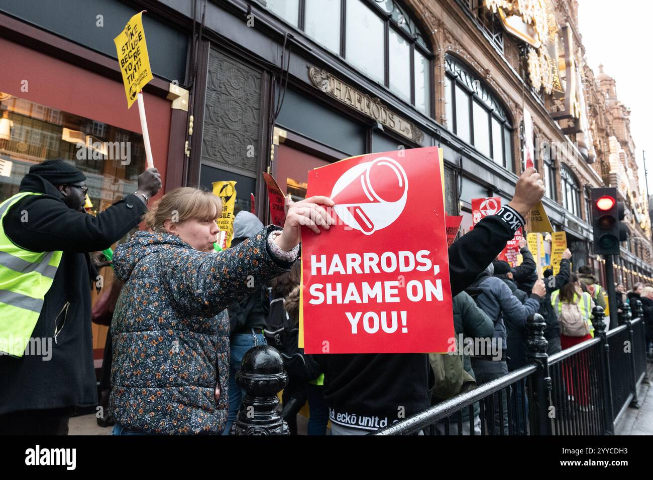 London, UK. 21 December, 2024. Workers at the upmarket Harrods ...