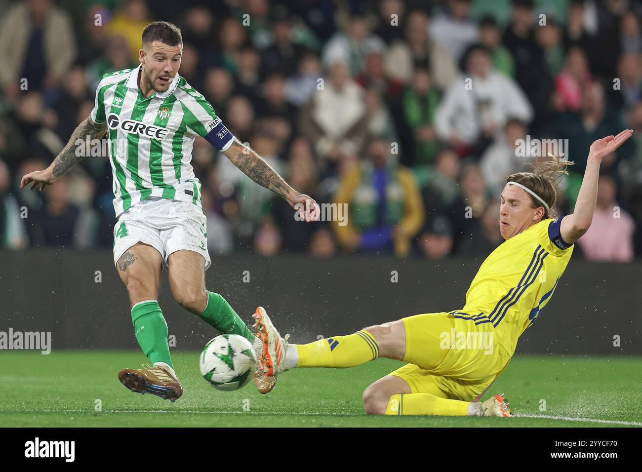 Aitor Ruibal of Real Betis and Lucas Lingman of HJK Helsinki during the ...