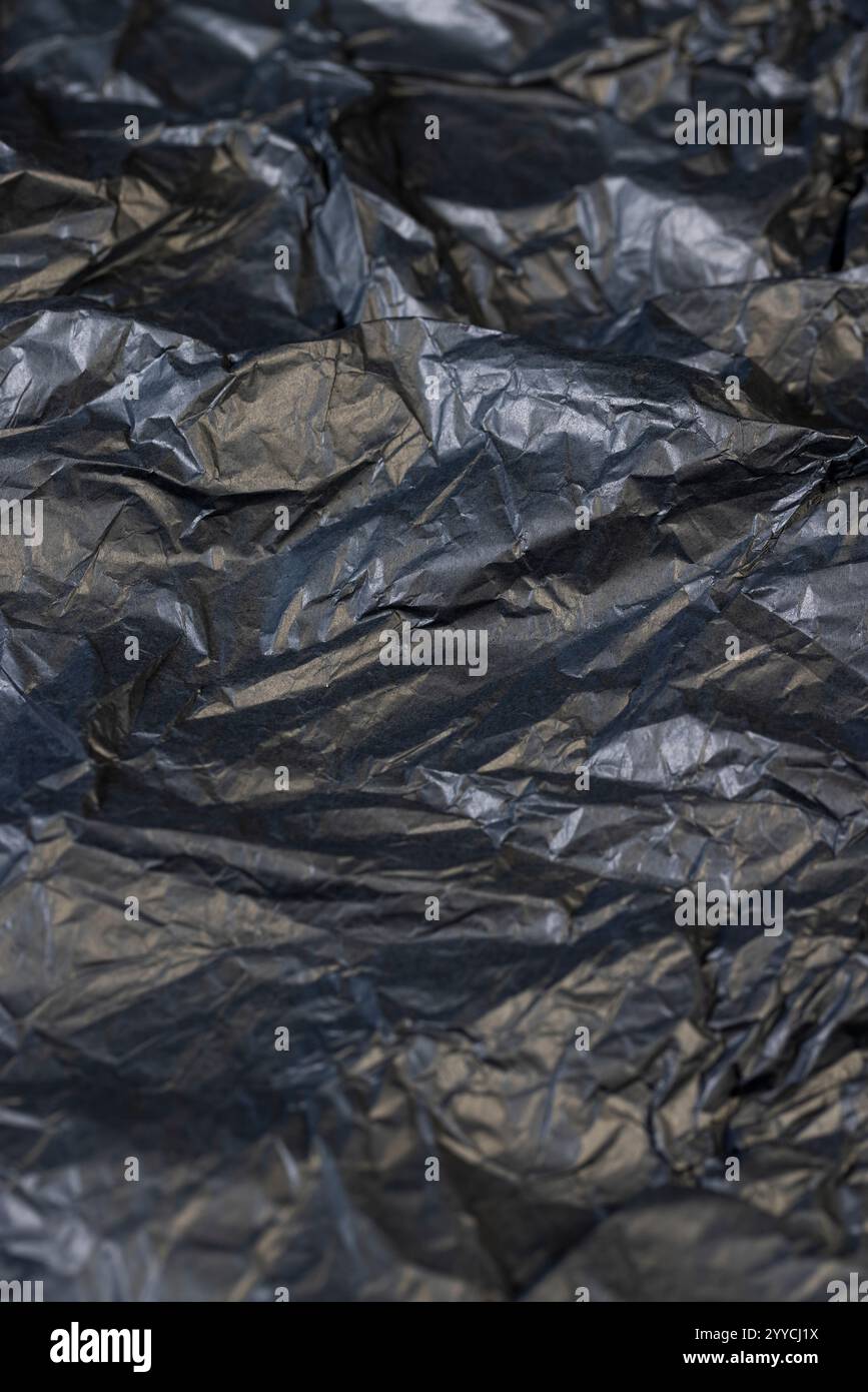 black wrapping paper in close-up, a piece of black soft paper for ...