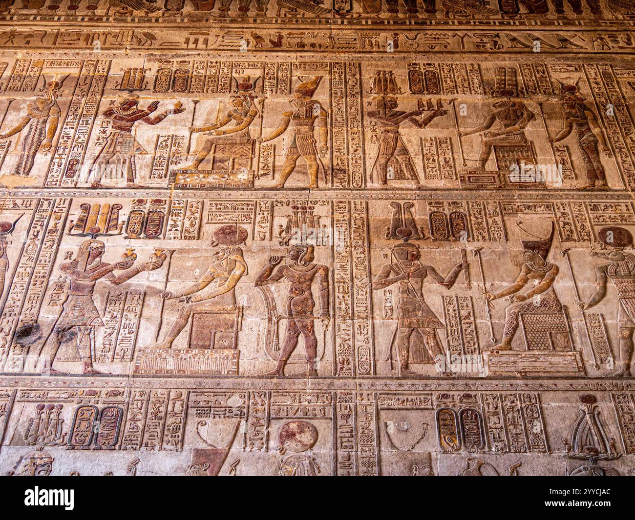 Hieroglyphic writing and carvings on the wall inside Khnum Temple in ...