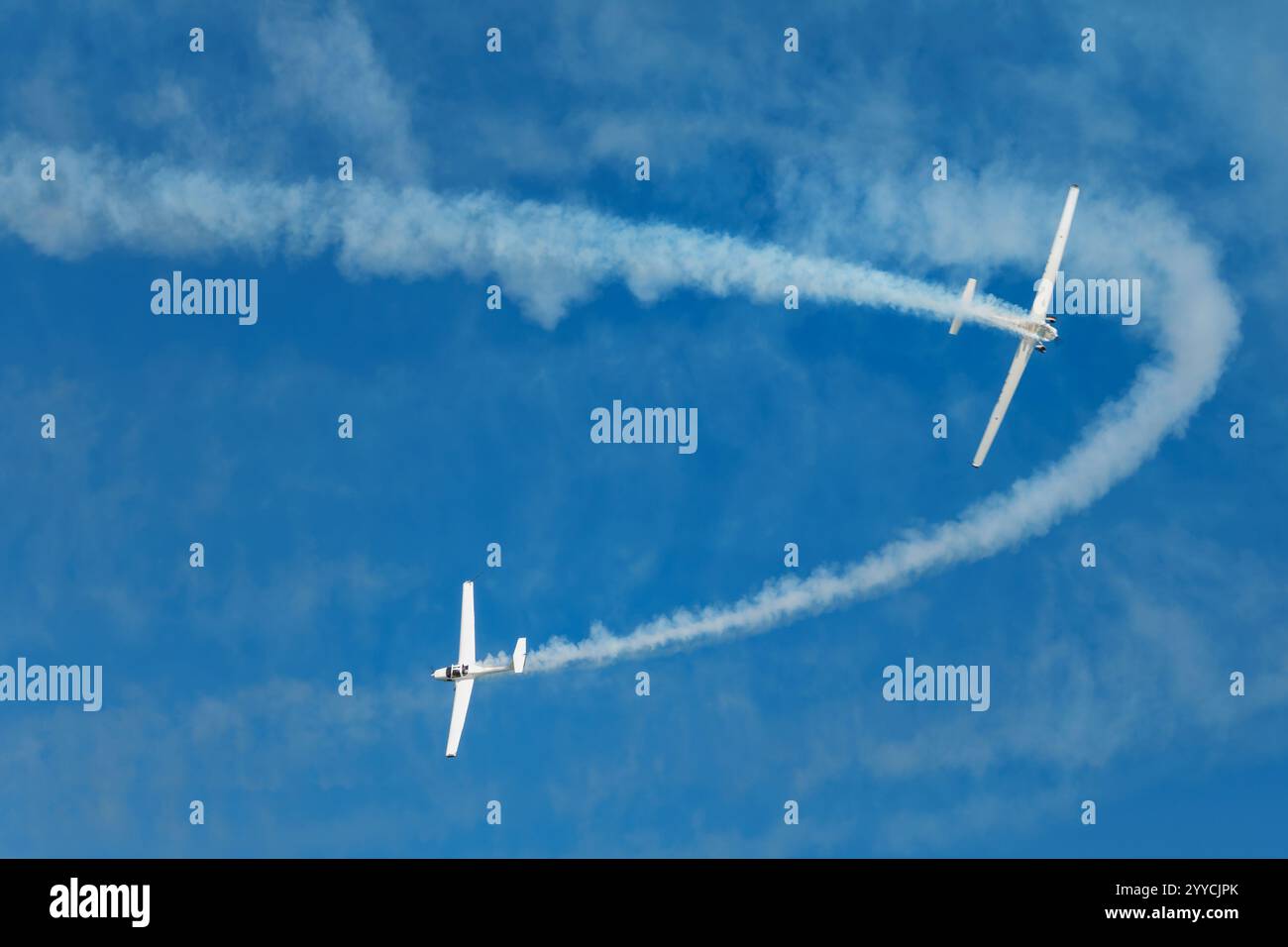 Stunt aerobatic plane performing stunts in air Stock Photo - Alamy
