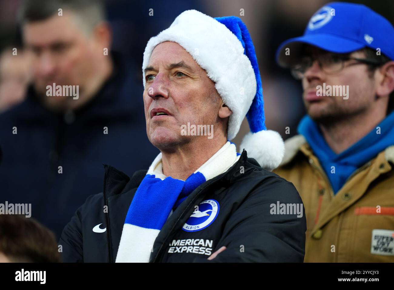 A Brighton and Hove Albion fan wearing a Santa hat in the stands before ...