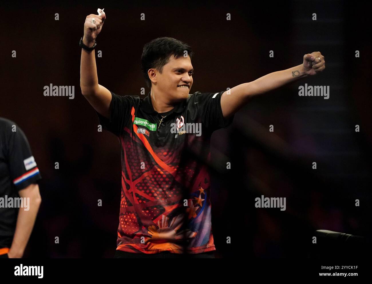 Alexis Toylo celebrates after winning his match against Richard ...