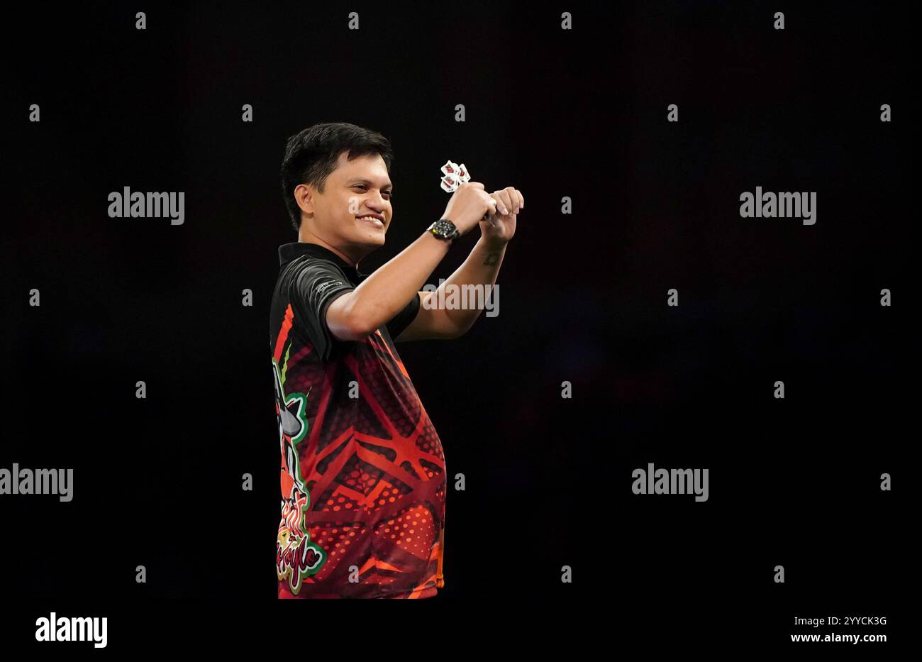 Alexis Toylo celebrates after winning his match against Richard ...