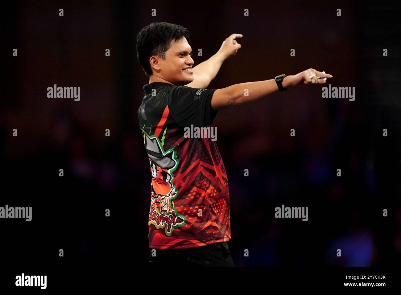 Alexis Toylo celebrates after winning his match against Richard ...