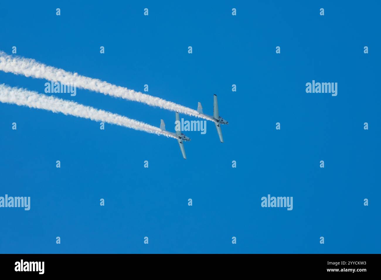 Stunt aerobatic plane performing stunts in air Stock Photo - Alamy