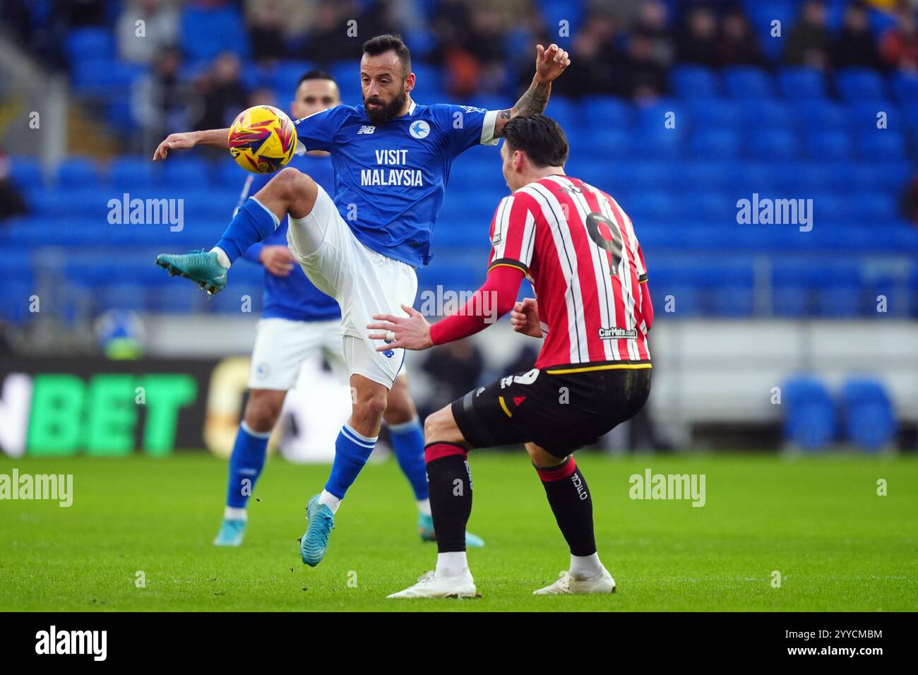 Cardiff City's Manolis Siopis (left) and Sheffield United's Kieffer ...