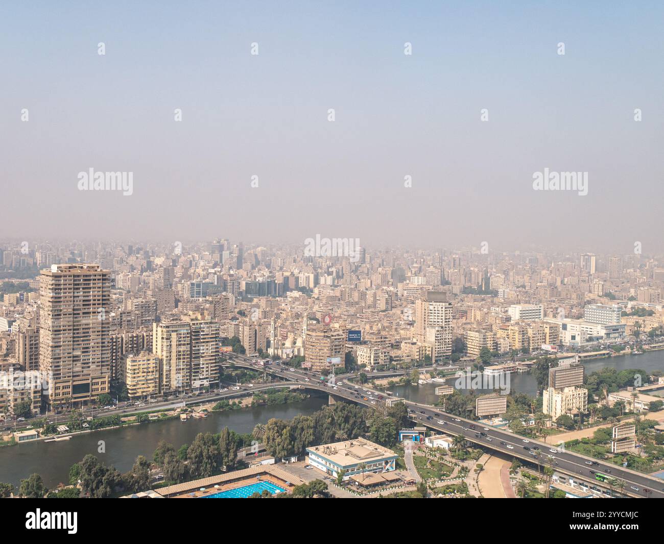 Panoramic views of Cairo's dense cityscape with smog and dust over the ...