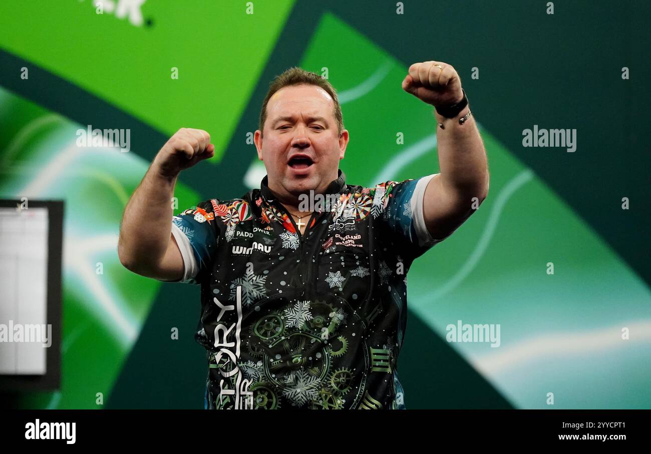 Brendan Dolan celebrates after winning his match against Lok-Yin Lee ...