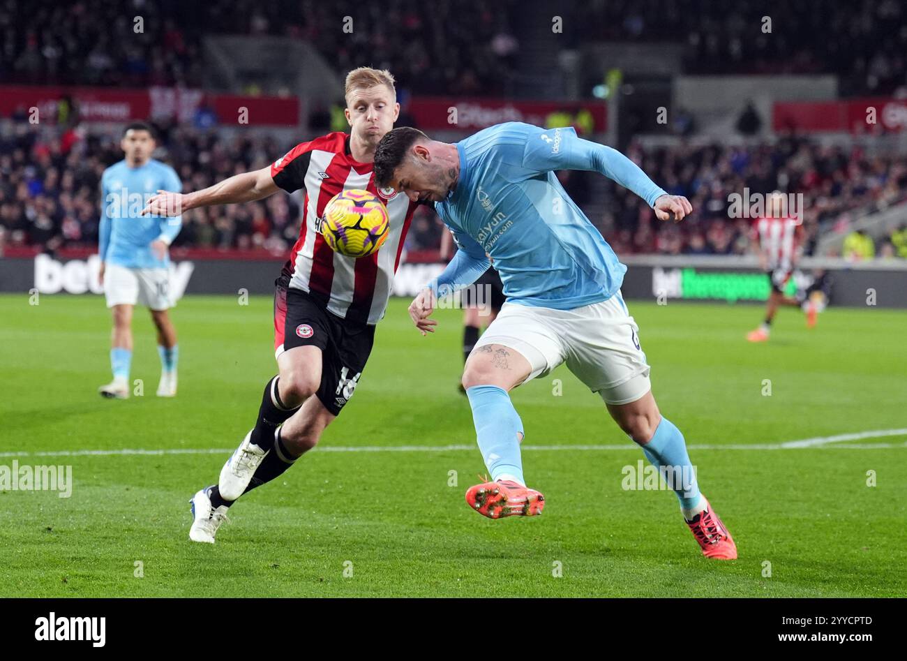 Nottingham Forest's Morato and Brentford's Ben Mee (left) battle for ...