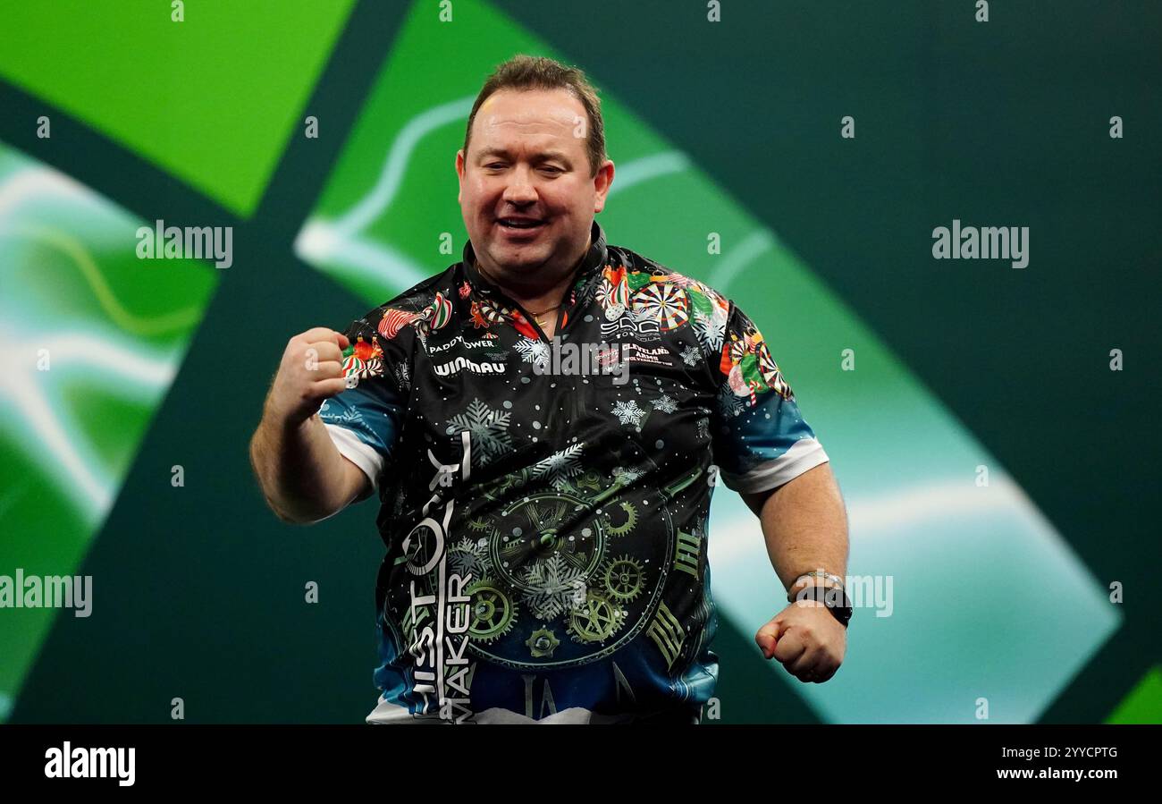 Brendan Dolan celebrates after winning his match against Lok-Yin Lee ...