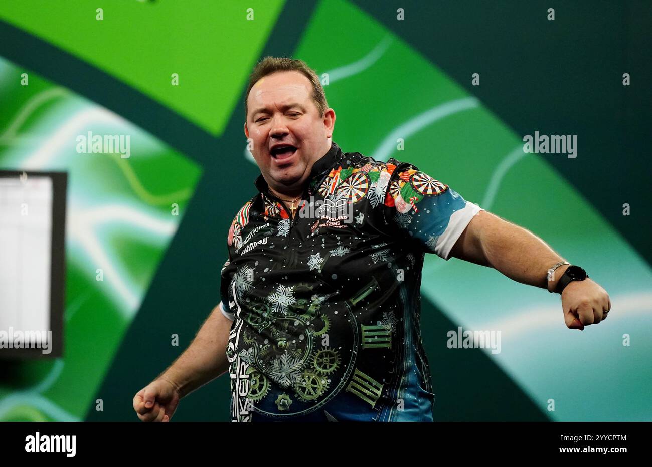 Brendan Dolan celebrates after winning his match against Lok-Yin Lee ...