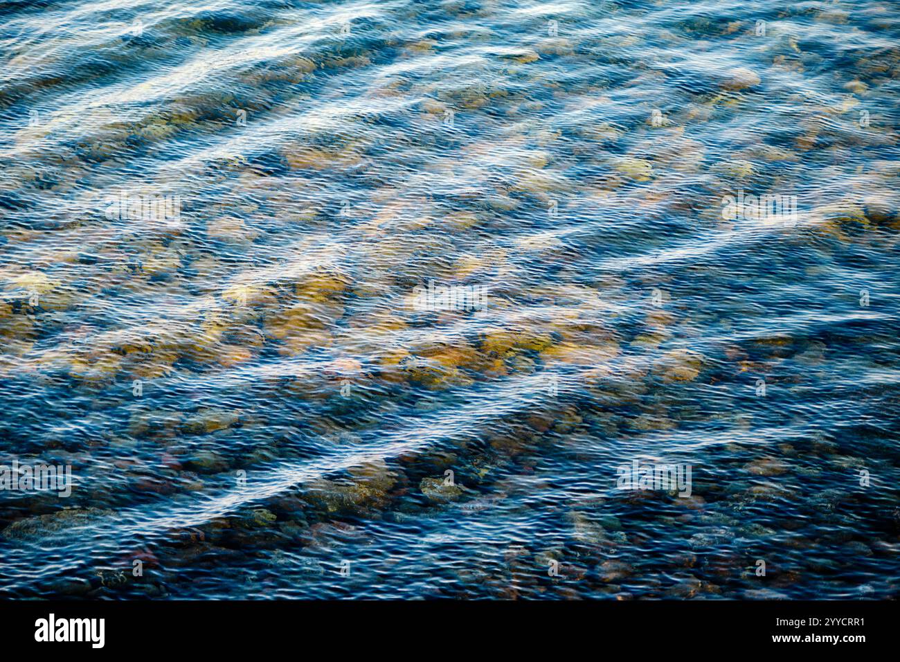 Sea water surface, water wave and stone under the sea Stock Photo - Alamy