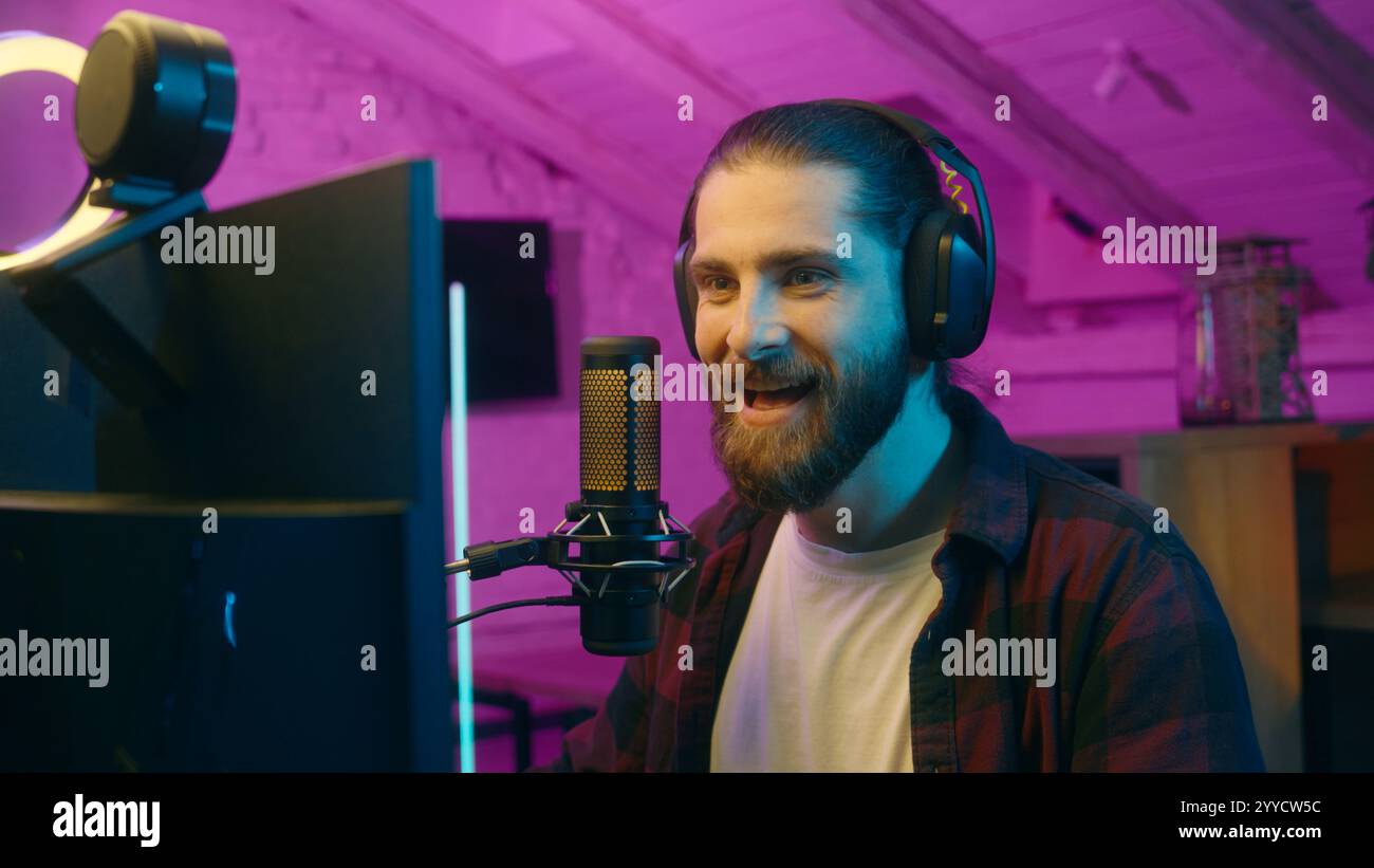 Shocked Caucasian man angry vlogger talking microphone mic addicted ...