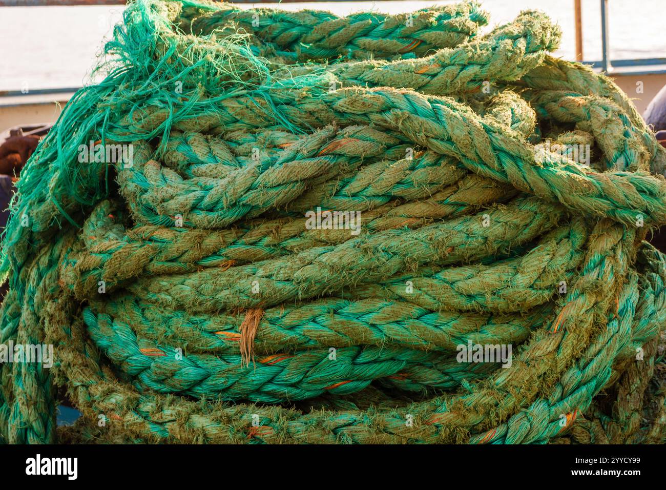 Textured Green Nautical Rope Coil on a Boat Deck Stock Photo - Alamy