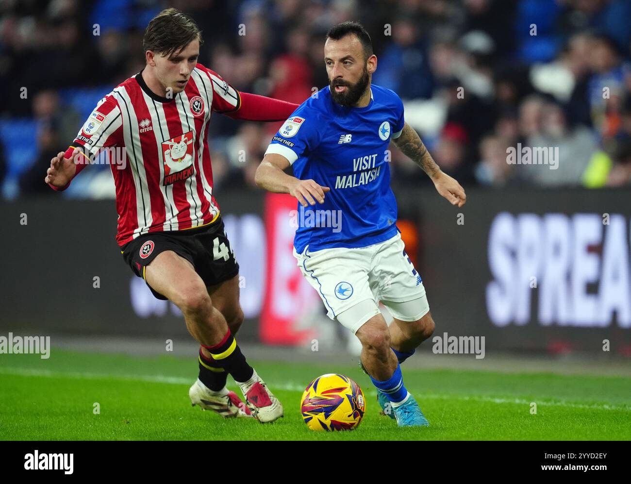 Cardiff City's Manolis Siopis (right) and Sheffield United's Sydie Peck ...