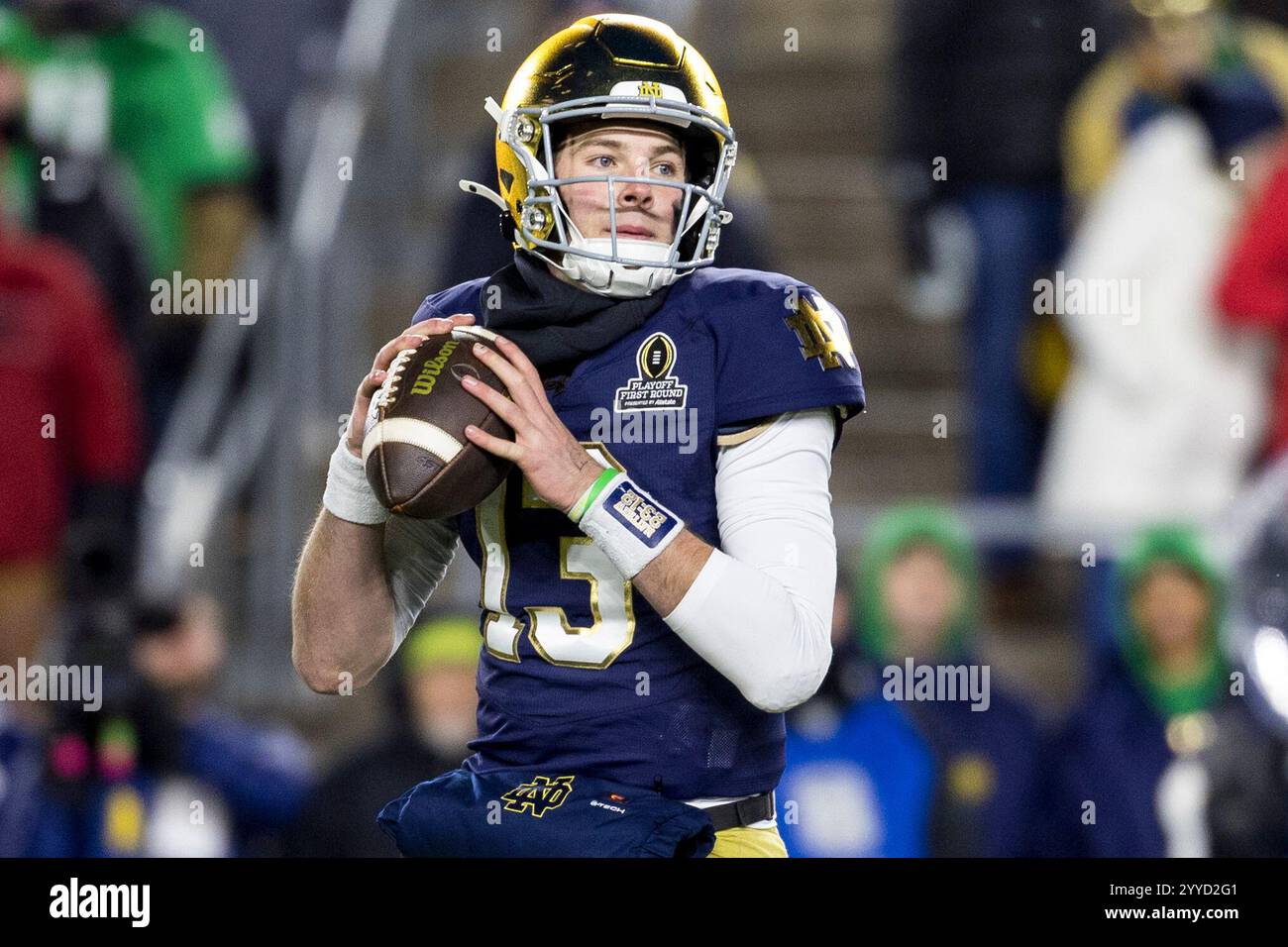 South Bend, Indiana, USA. 20th Dec, 2024. Notre Dame quarterback Riley Leonard (13) passes the ...