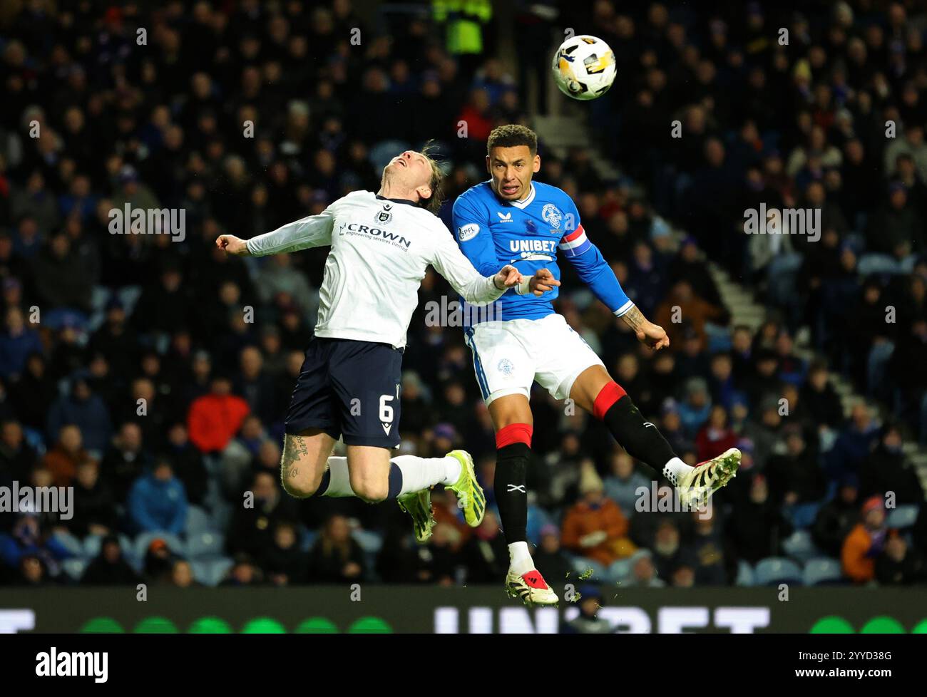 Dundee's Jordan McGhee (left) and Rangers' James Tavernier battle for ...