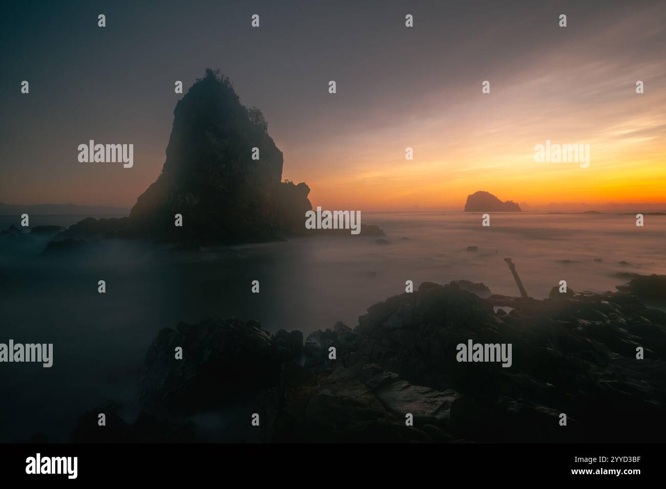 A breathtaking view of Diguisit Rock Formation at sunset, where rugged ...